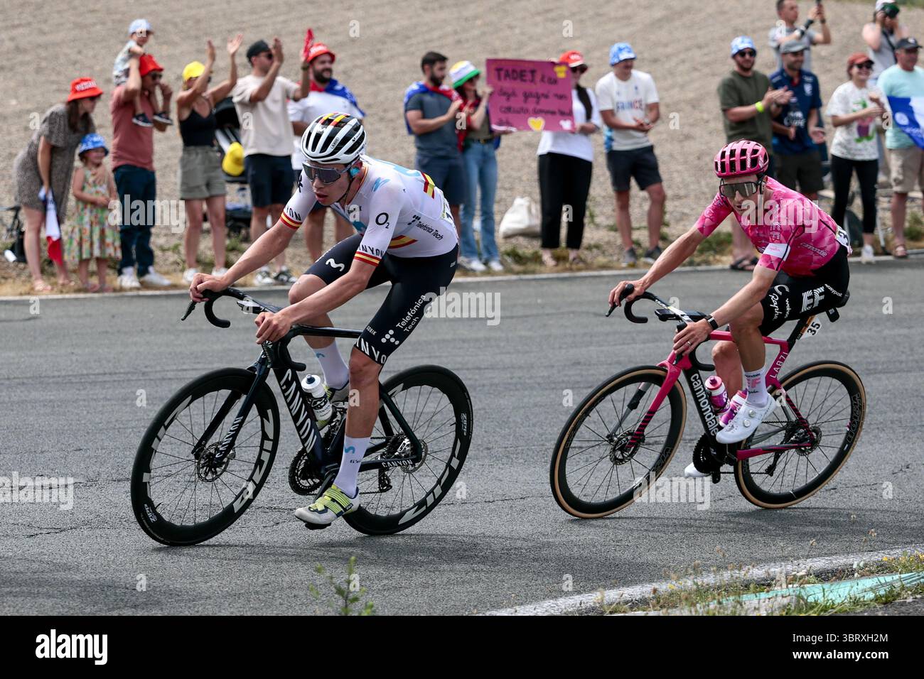 Spanish Ivan Romeo of Movistar Team and American Neilson Powless of EF ...