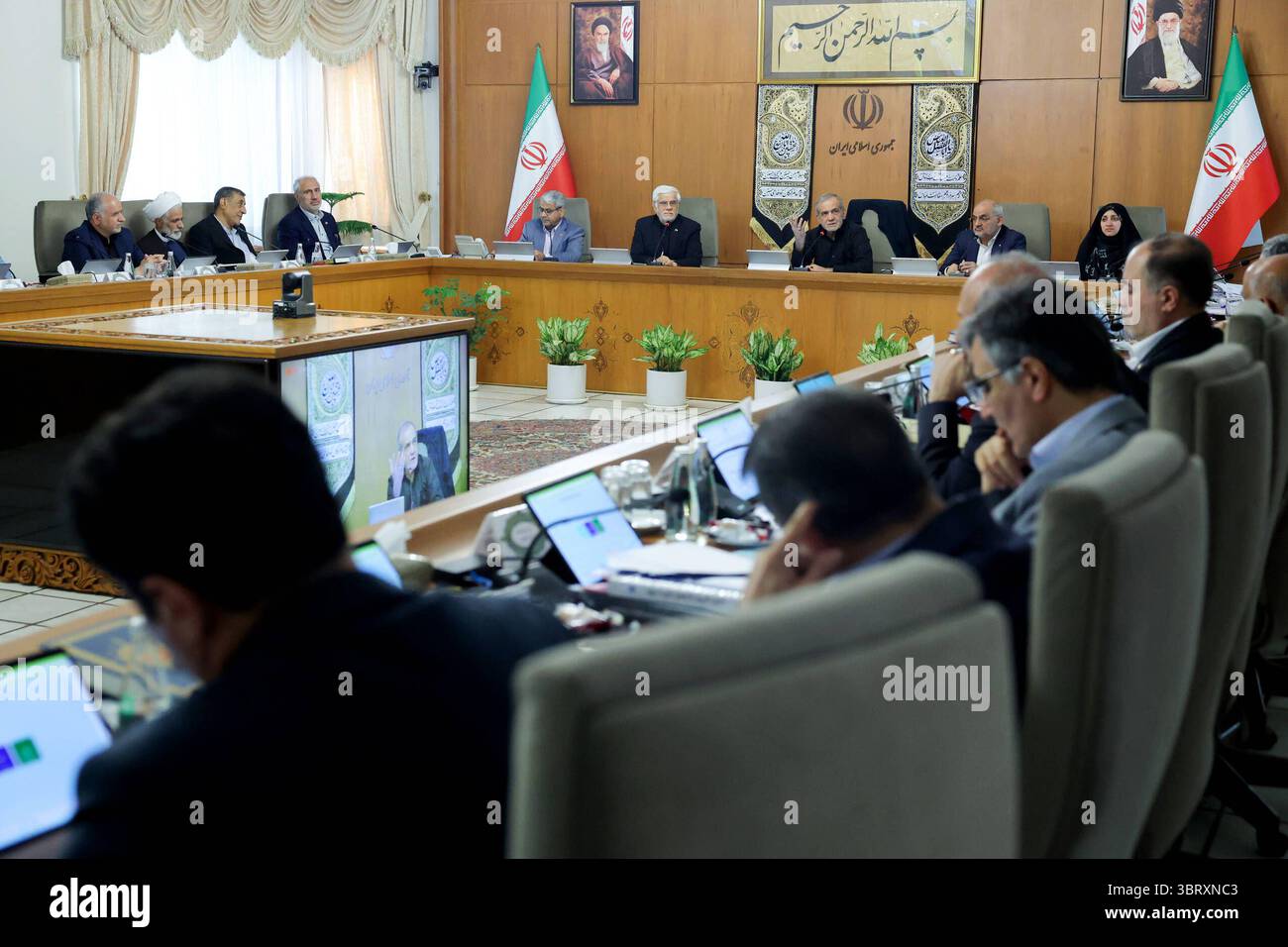 Iranian President Masoud Pezeshkian chairs a meeting of the Iranian ...