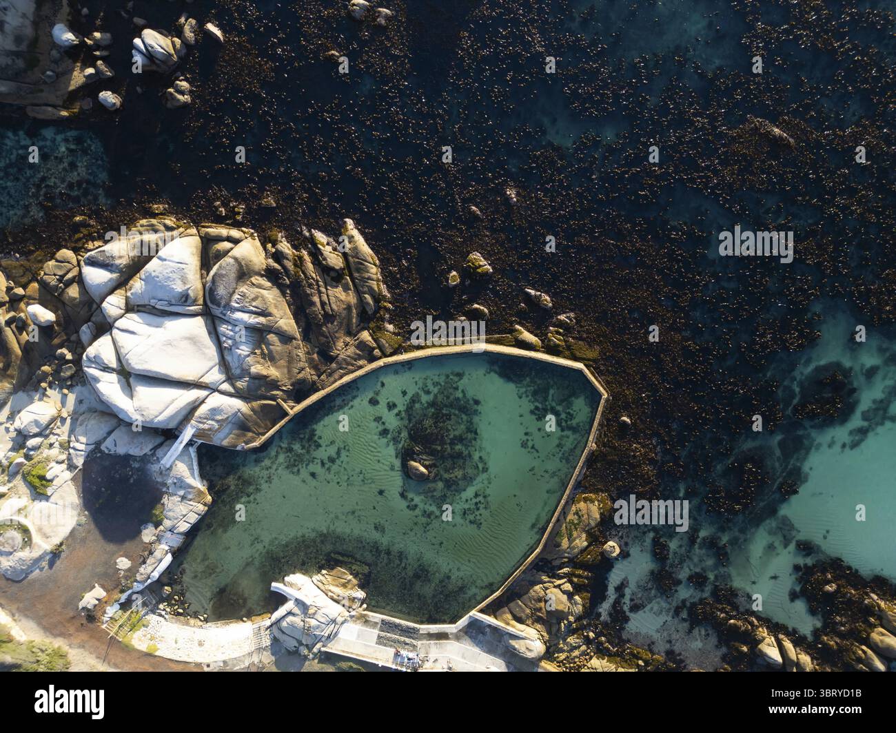 Aerial view of the contrast between the clear turquoise waters of the ...