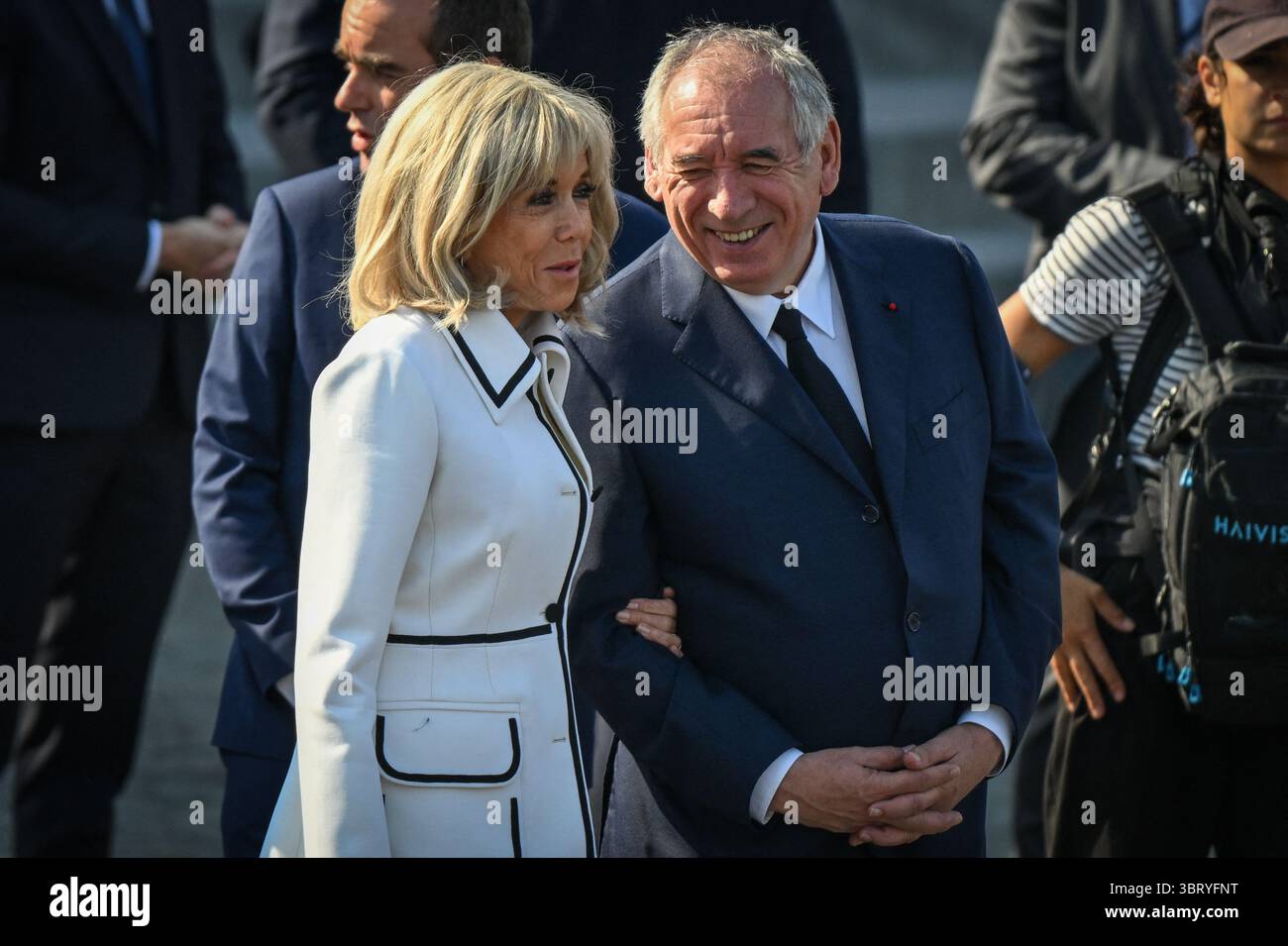 French First Lady Brigitte Macron speaks with French Prime Minister ...