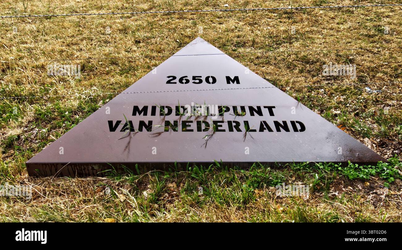 Geographic center marker of netherlands, triangular metal sign rising ...