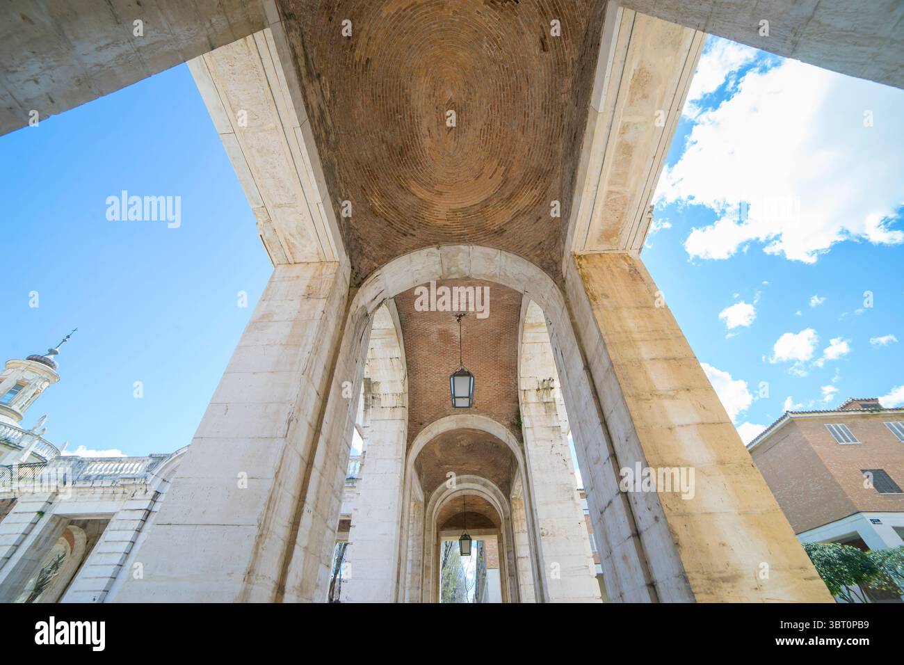 Visitors admire the intricate architecture of the old arches in ...