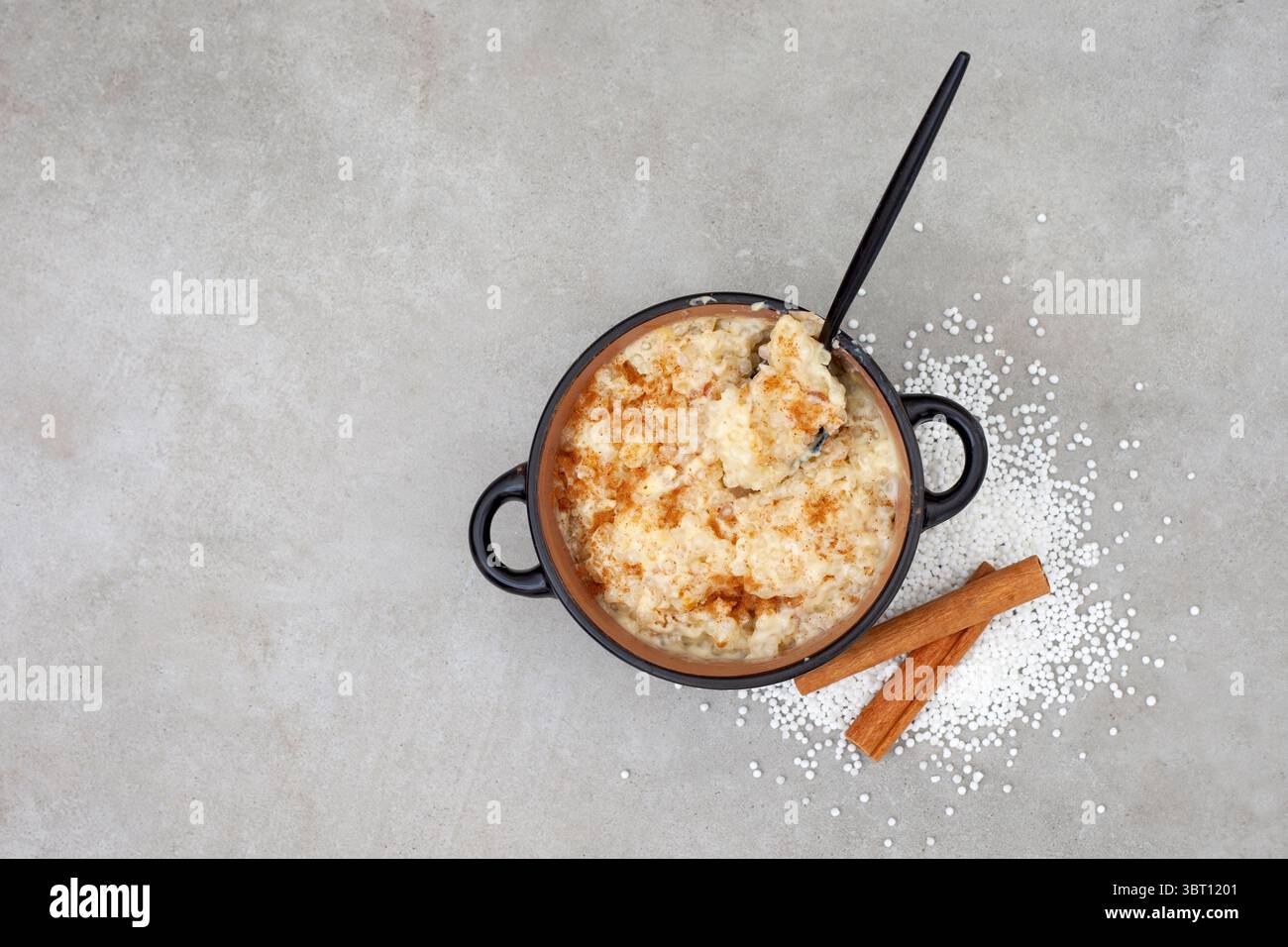 top down view of a small pot shaped bowl filled with South African tapioca or sago dessert. lots ...