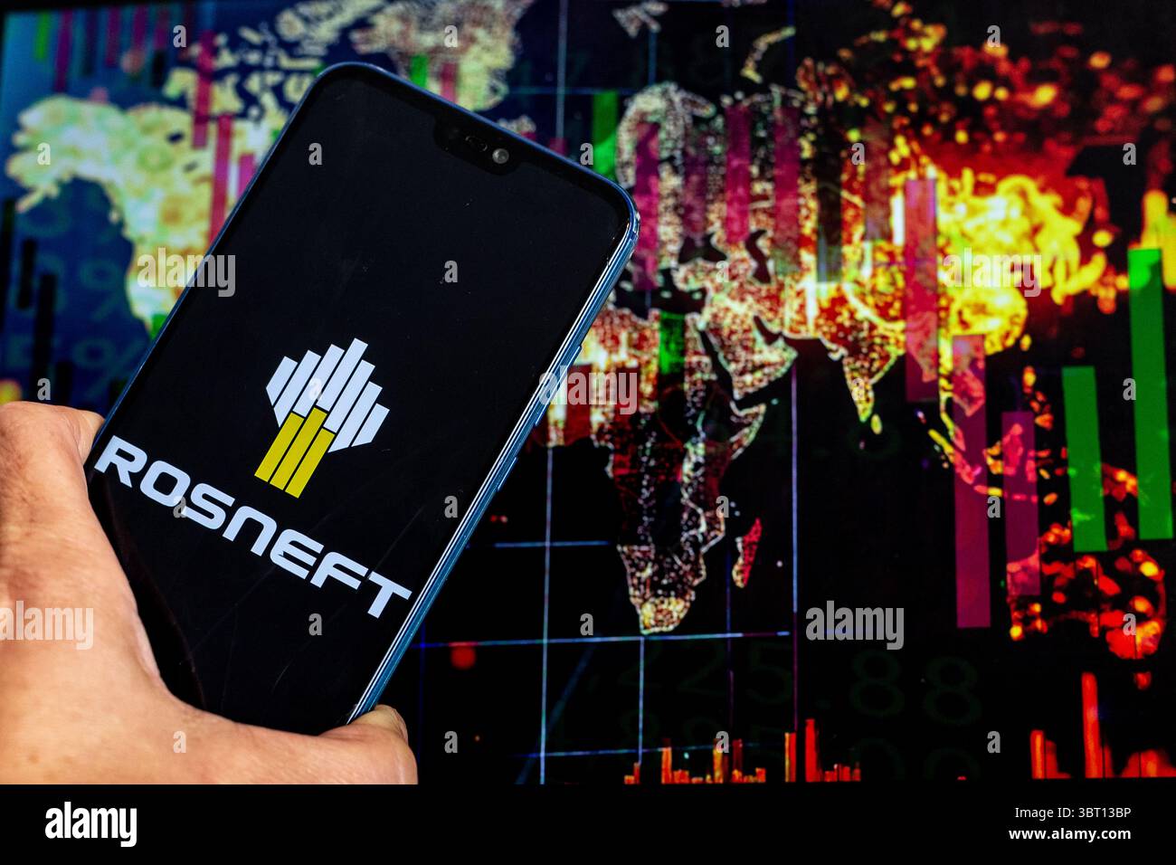 In this phot illustration, a Rosneft logo is seen displayed on a phone ...