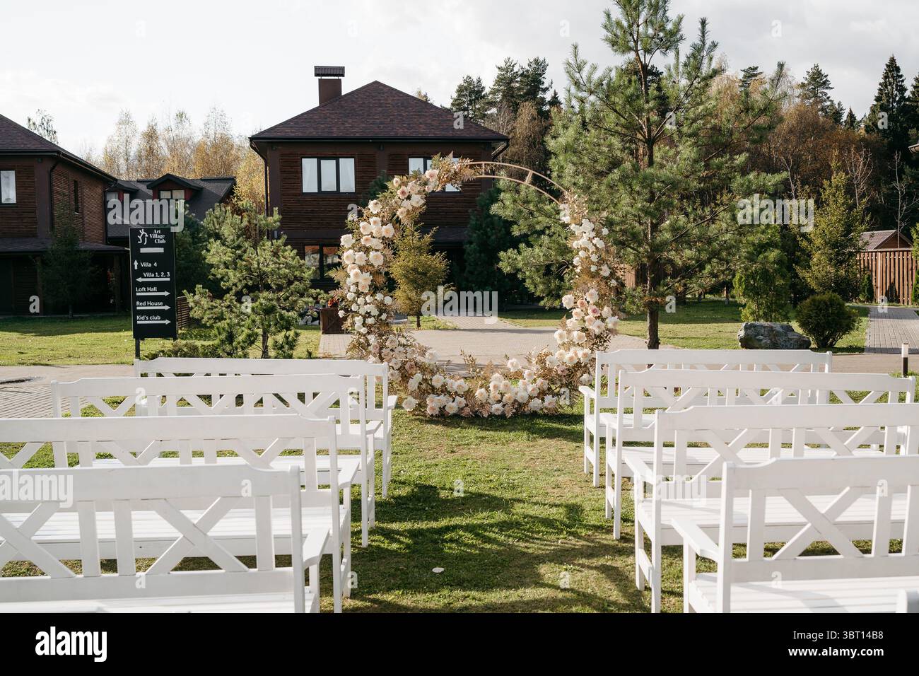 Floral wedding arch chairs benches hi-res stock photography and images ...