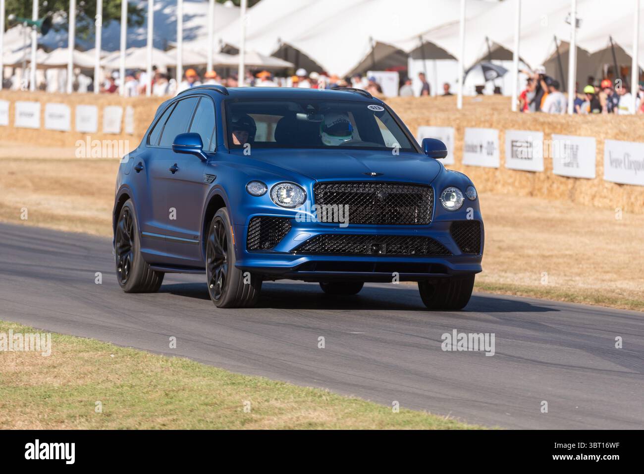 Bentley Bentayga Speed car driving up the hill climb track at the ...