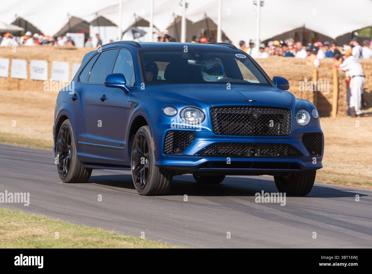 Bentley Bentayga Speed car driving up the hill climb track at the ...