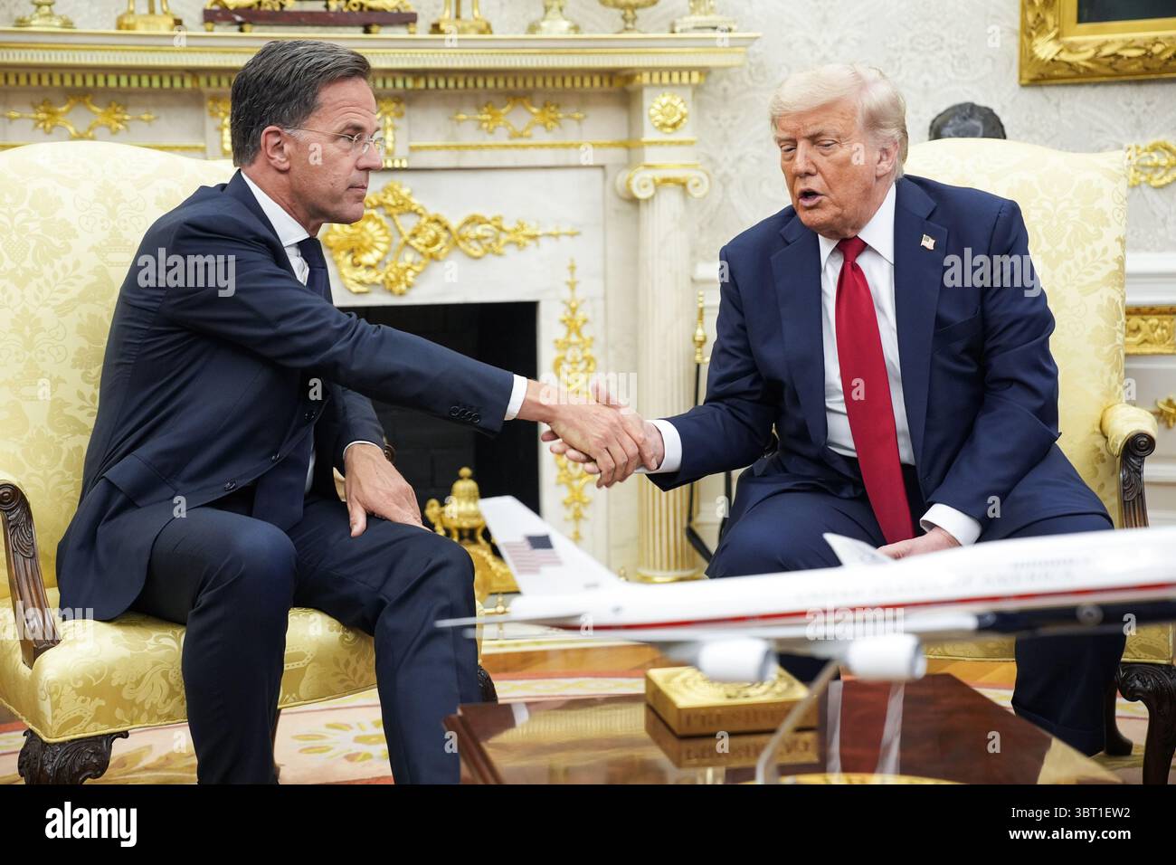 NATO Secretary General Mark Rutte shakes hands with US President Donald ...