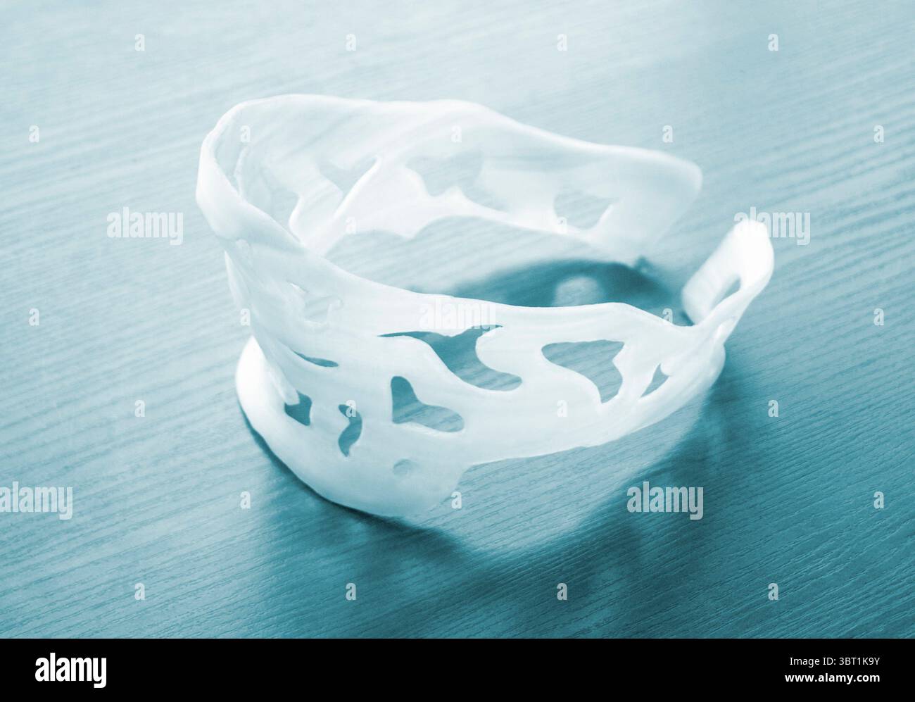 Medical plastic orthosis fixator overlay created on 3D printer. Neck ...