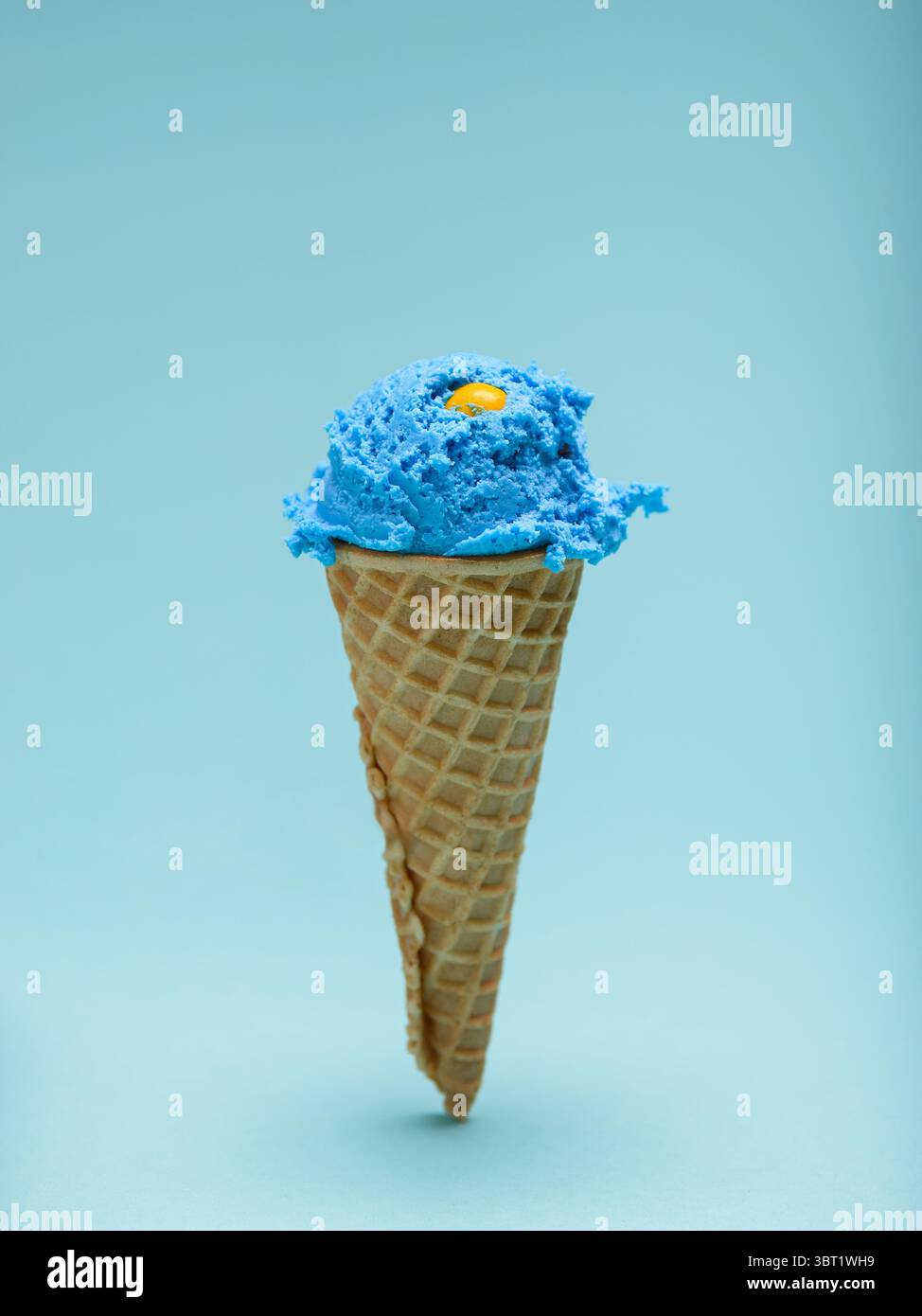 Blue bubble gum ice cream cone isolated on blue background Stock Photo ...
