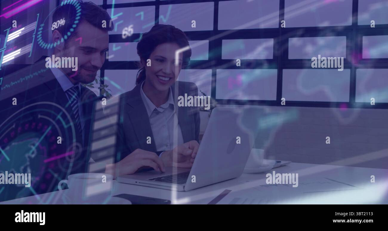 Smiling colleagues in business attire reviewing chart overlay on laptop ...