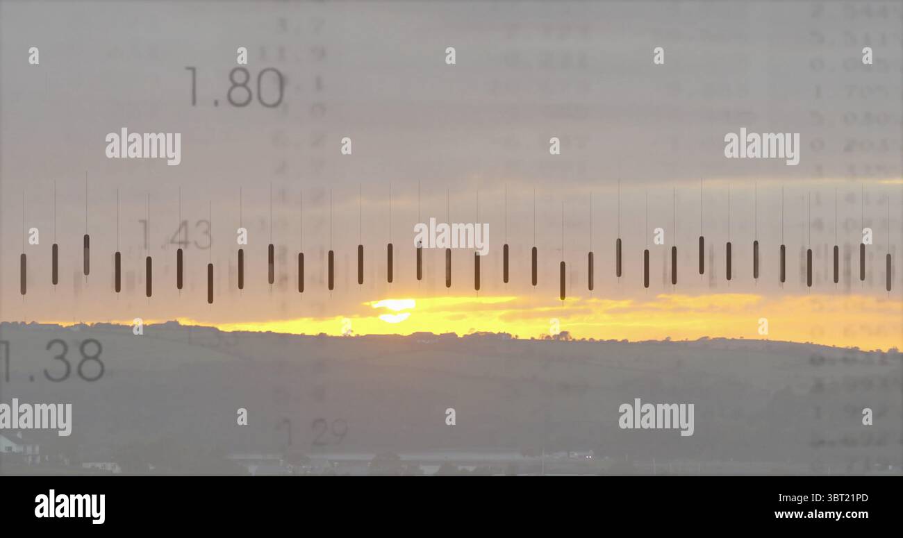 Glowing sun disk peeking through layered clouds above hillside at ...