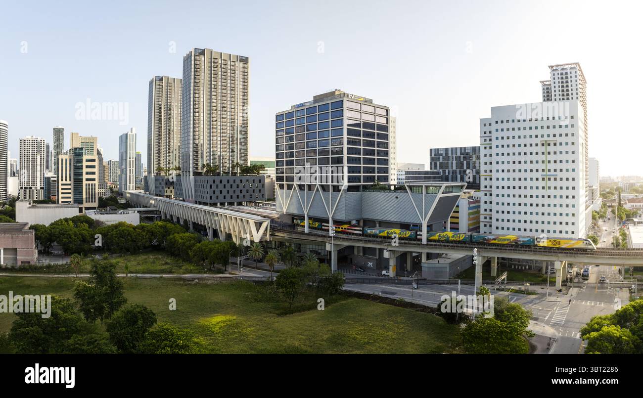 Aerial view of skyscrapers and the Metromover train gliding through the ...
