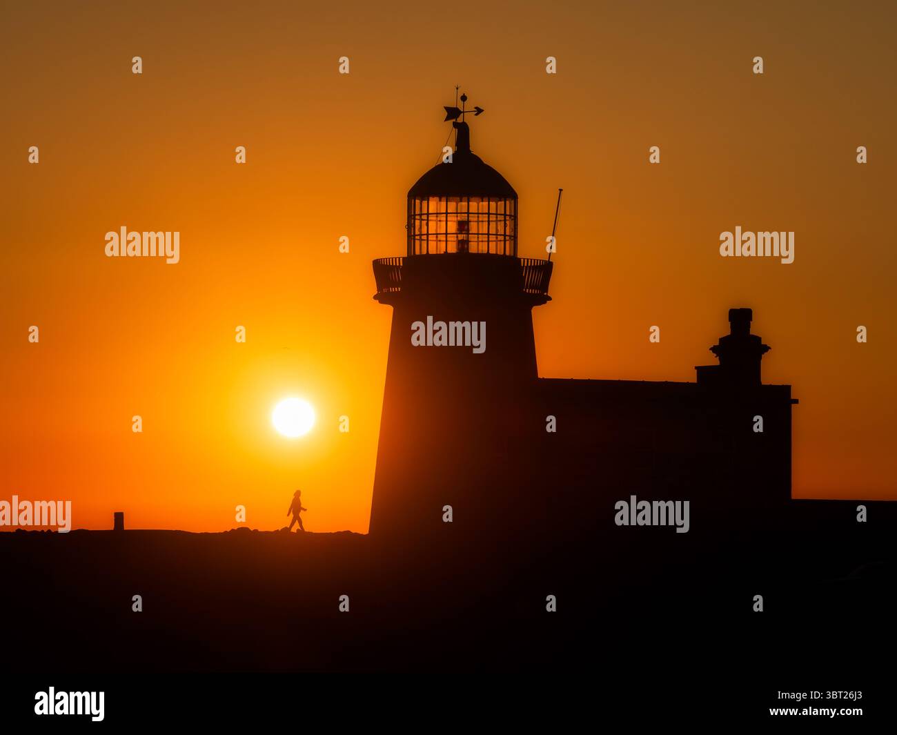 Sunrise beside Howth Lighthouse Stock Photo - Alamy
