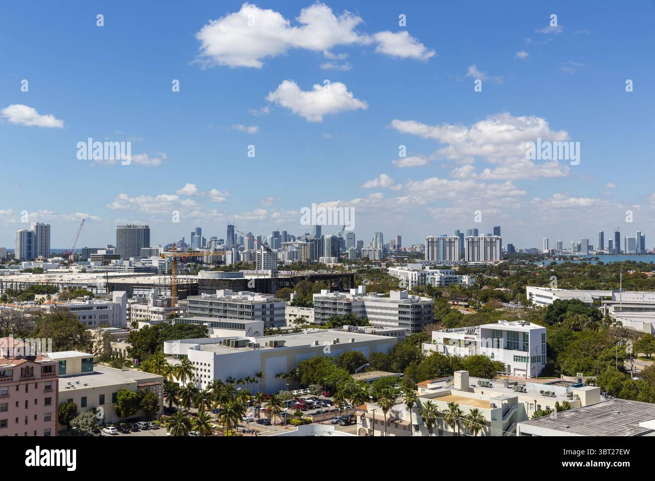 Aerial view of the sprawling cityscape meets the horizon, where ...