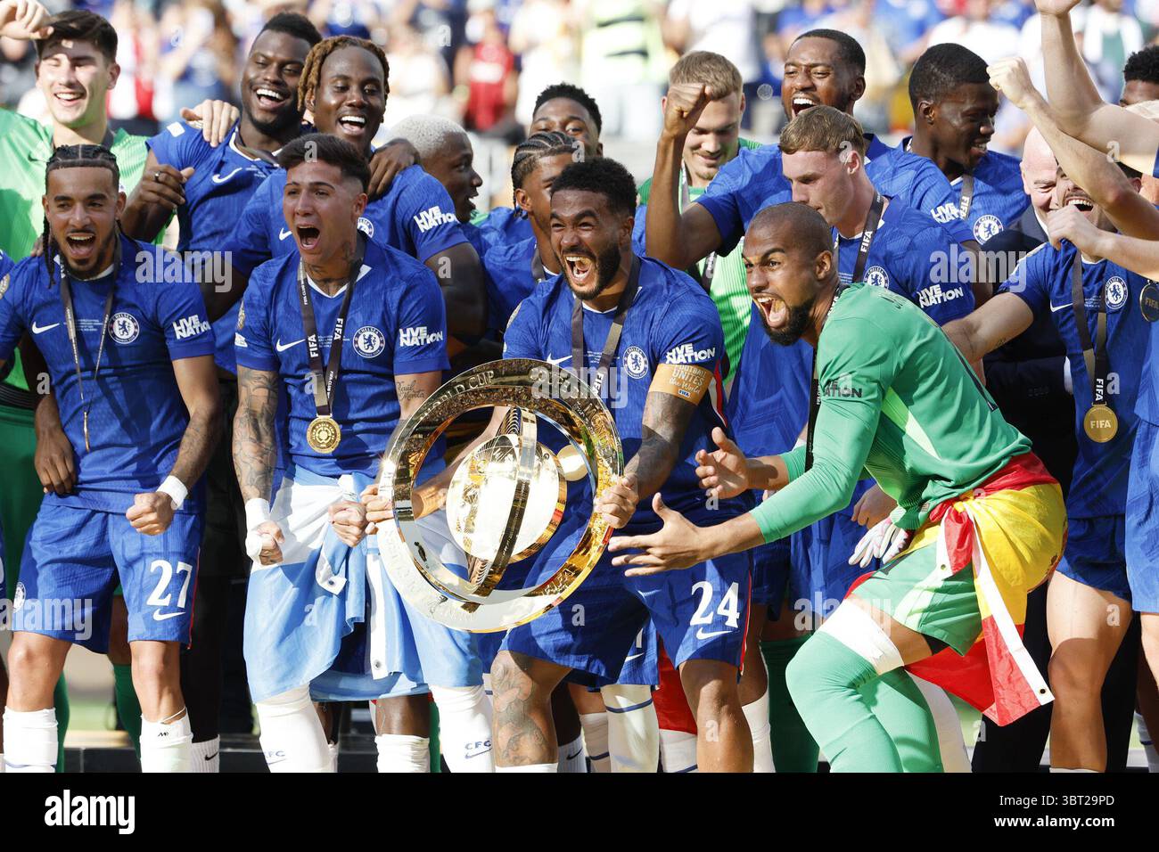 Reece James of Chelsea and teammates celebrate during the trophy ...