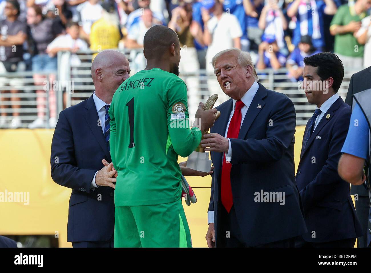 EAST RUTHERFORD, NJ - JULY 13: President Donald J. Trump presents ...