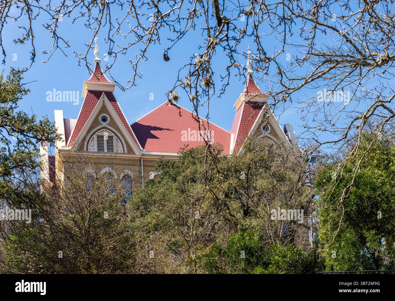 Historic building of Old Main on the campus of Texas State University ...
