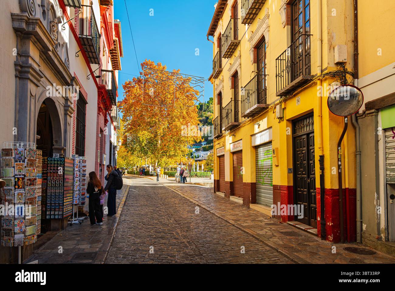 The medieval Carerra del Darro street running along the left bank of ...