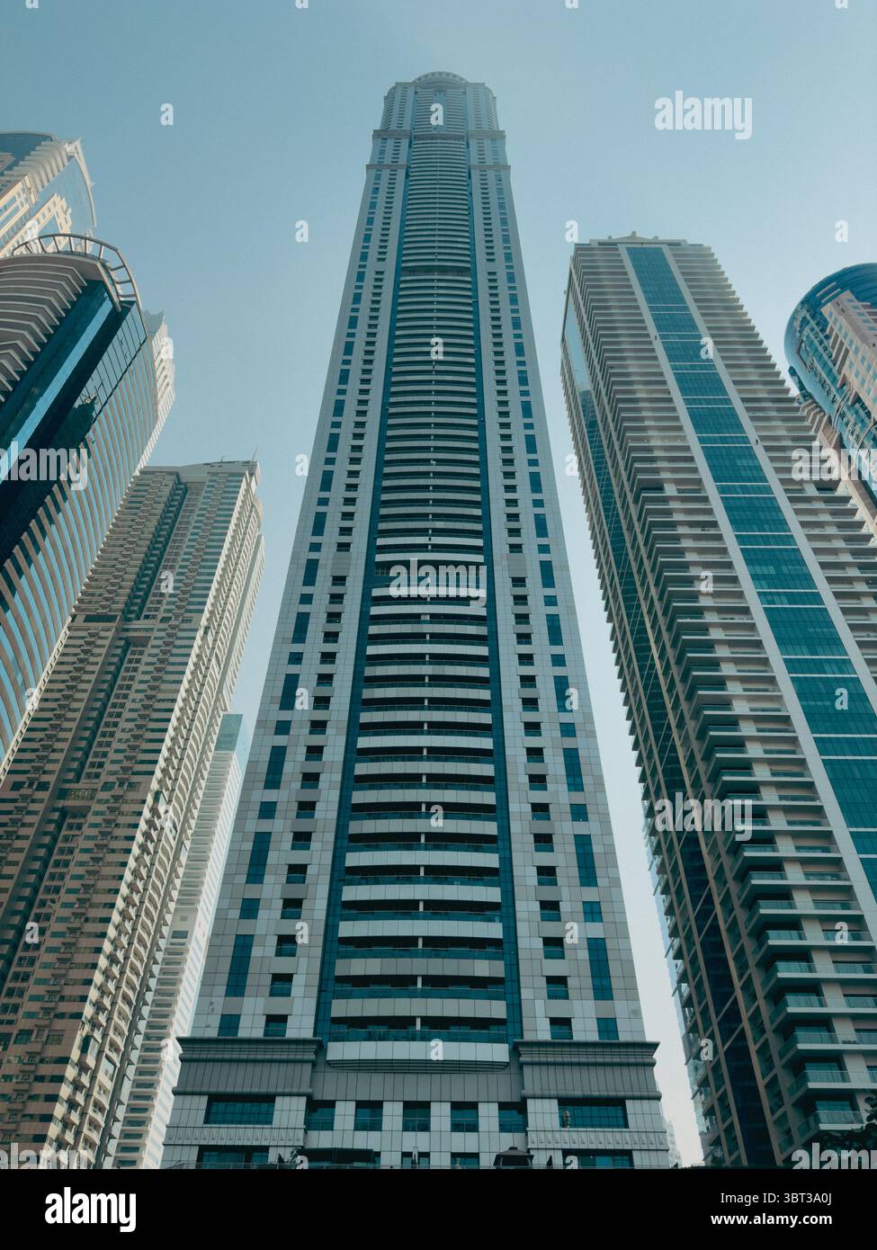 vertical stock image of Contemporary Dubai skyline with towering ...