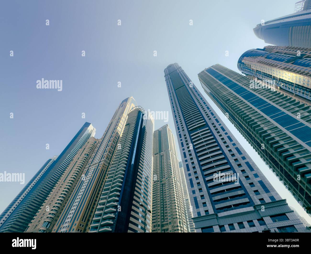Urban perspective of Dubai Marina skyscrapers from roadside angle Stock ...
