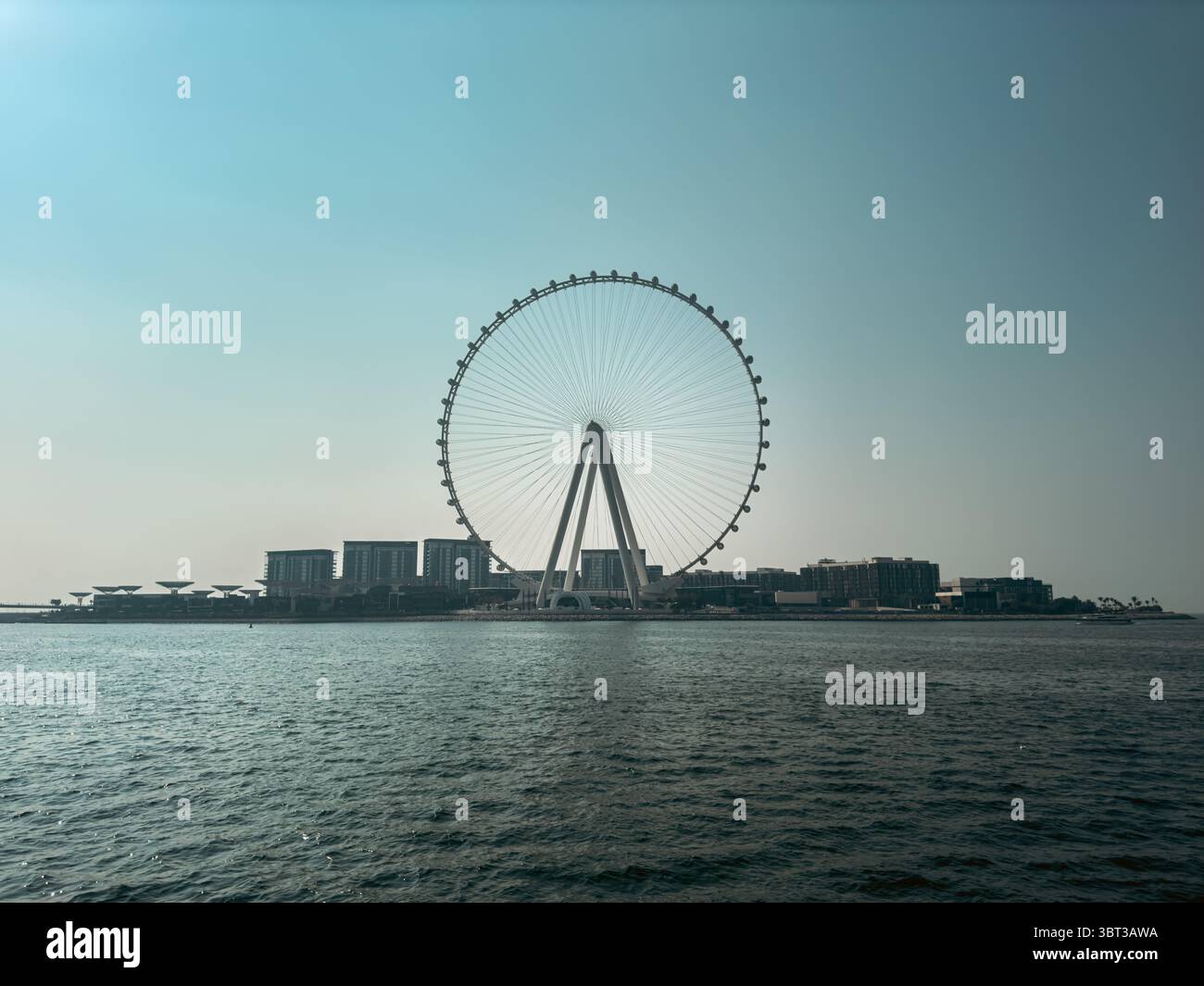 Iconic Dubai Marina waterfront view featuring Dubai Ain and sea horizon ...