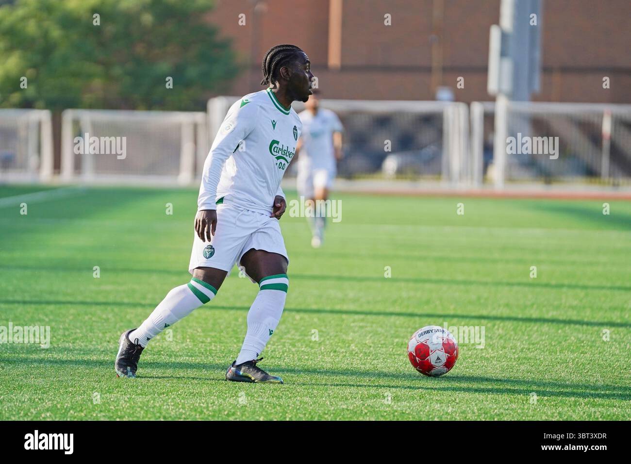 Adonijah Reid #10 of York United FC runs whit the ball during the ...