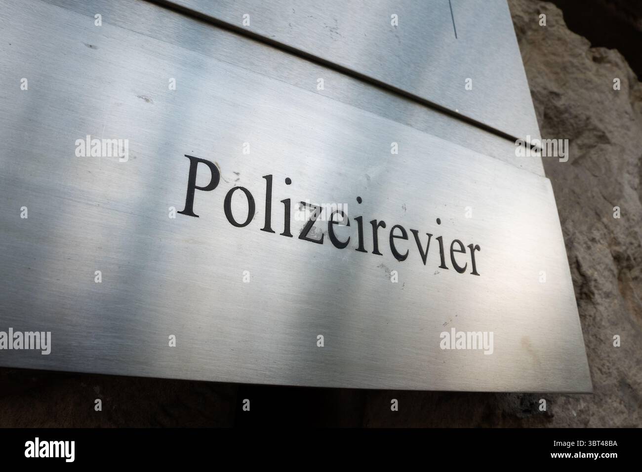 Polizeirevier (police station) sign in Germany. Signage on a building ...