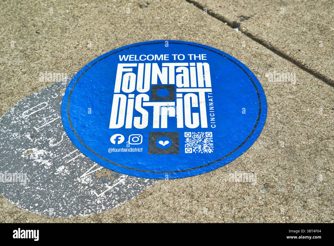 Sidewalk sign for the "Fountain District" in downtown Cincinnati Ohio ...