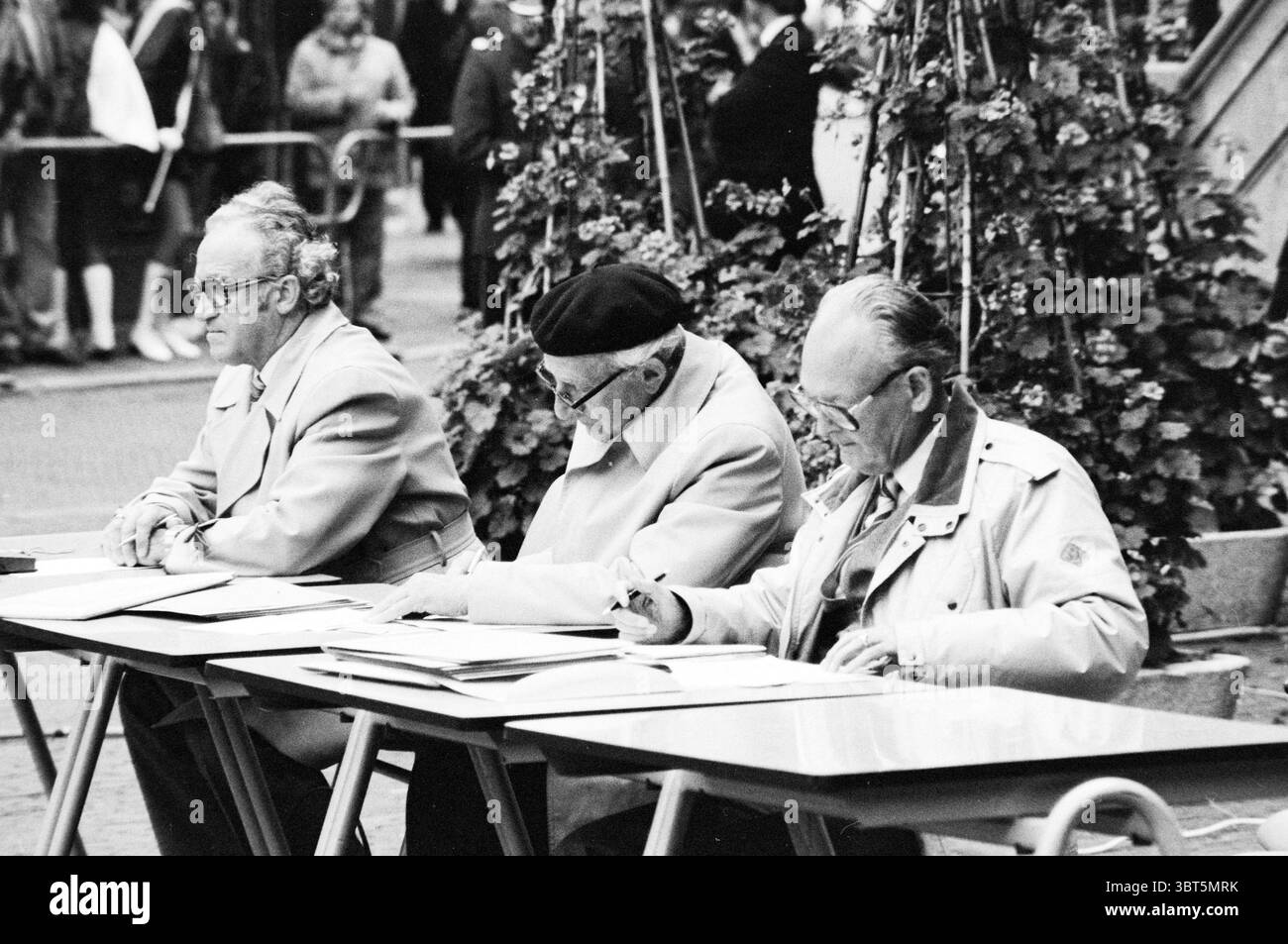 Scene depicts three elderly men seated hi-res stock photography and ...
