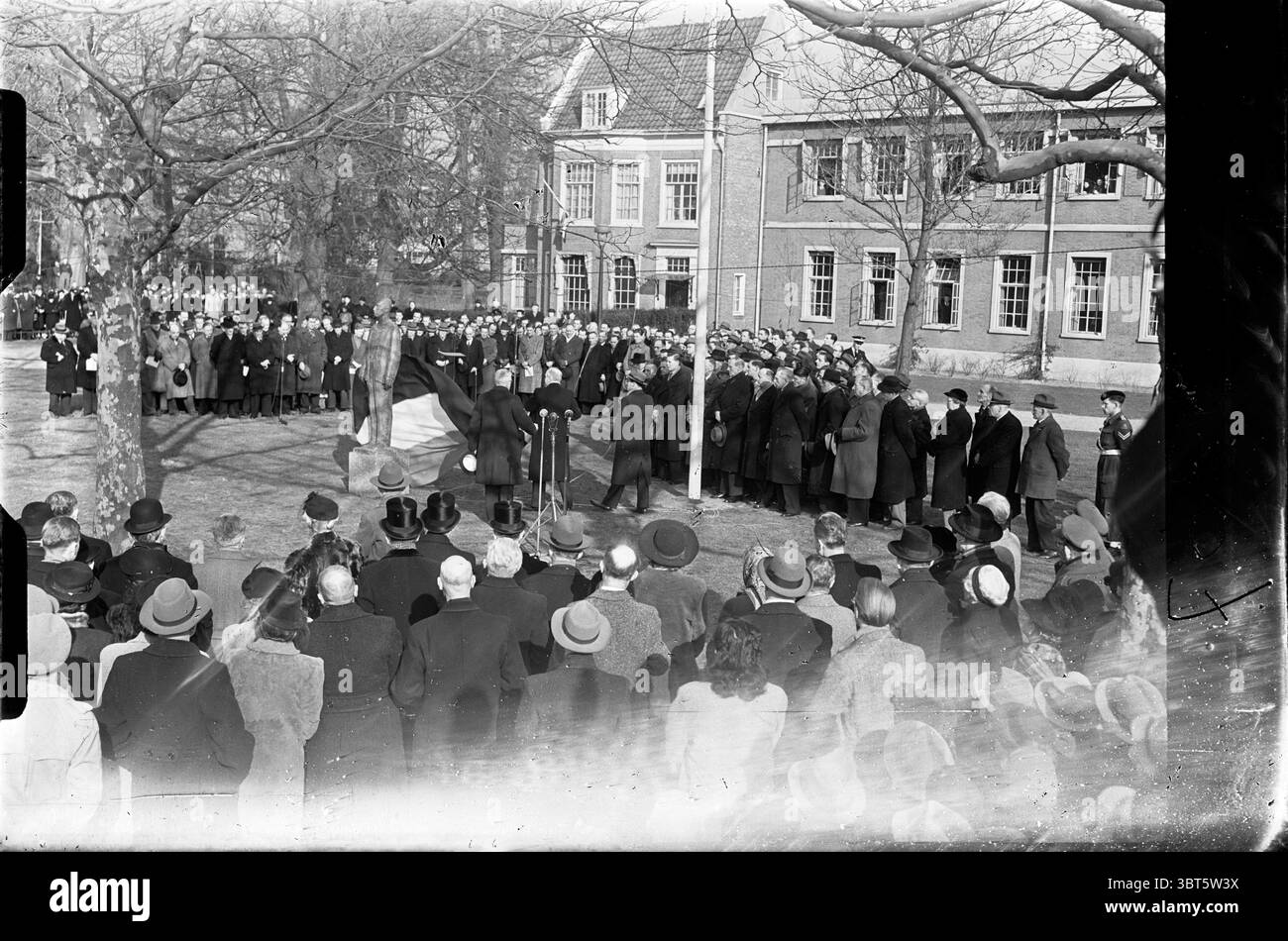 Gathering of somber figures stands hi-res stock photography and images ...