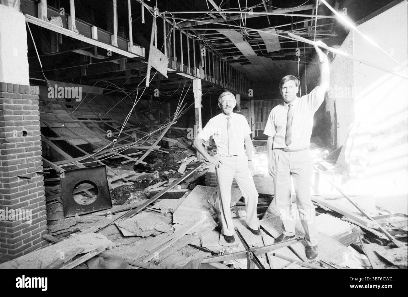 Contrast men standing in Black and White Stock Photos & Images - Alamy