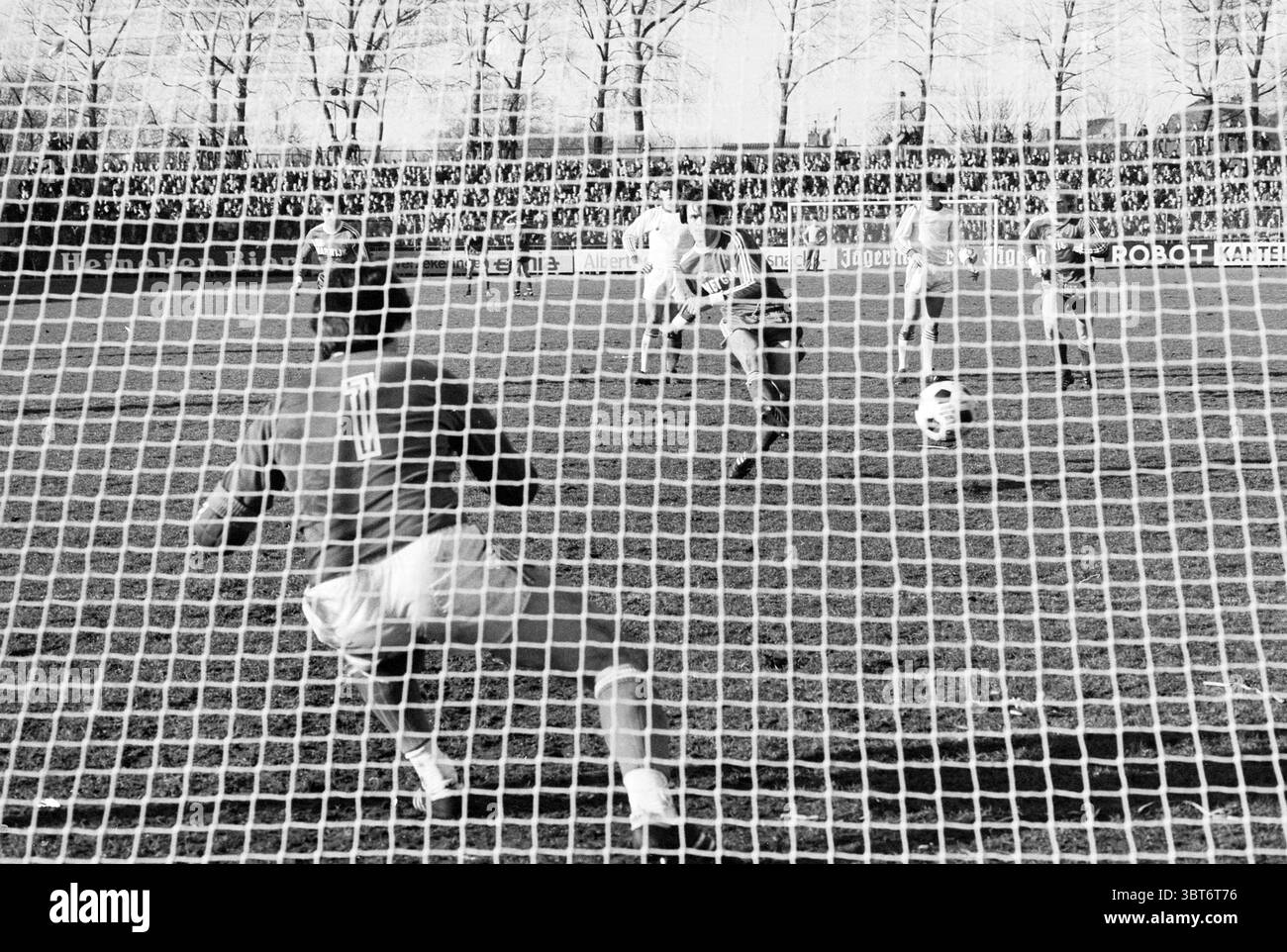 Goalkeepers stance conveys tension hi-res stock photography and images ...