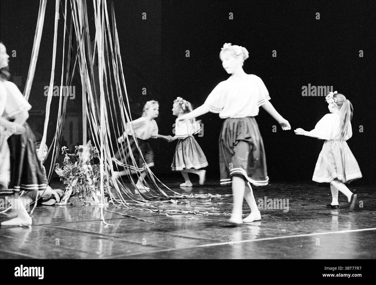 Group young dancers in flowing hi-res stock photography and images - Alamy