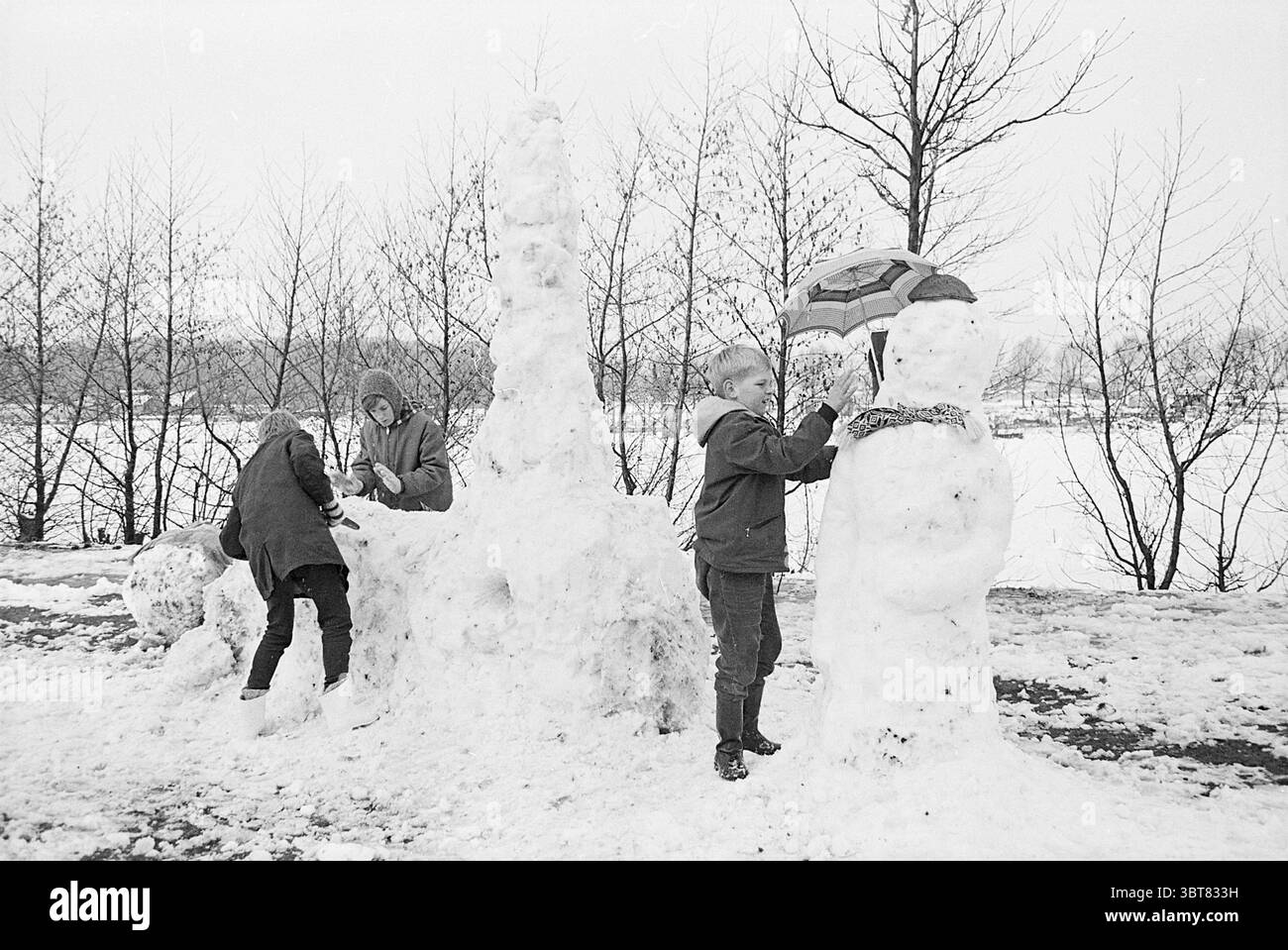 Constructing snow figures hi-res stock photography and images - Alamy