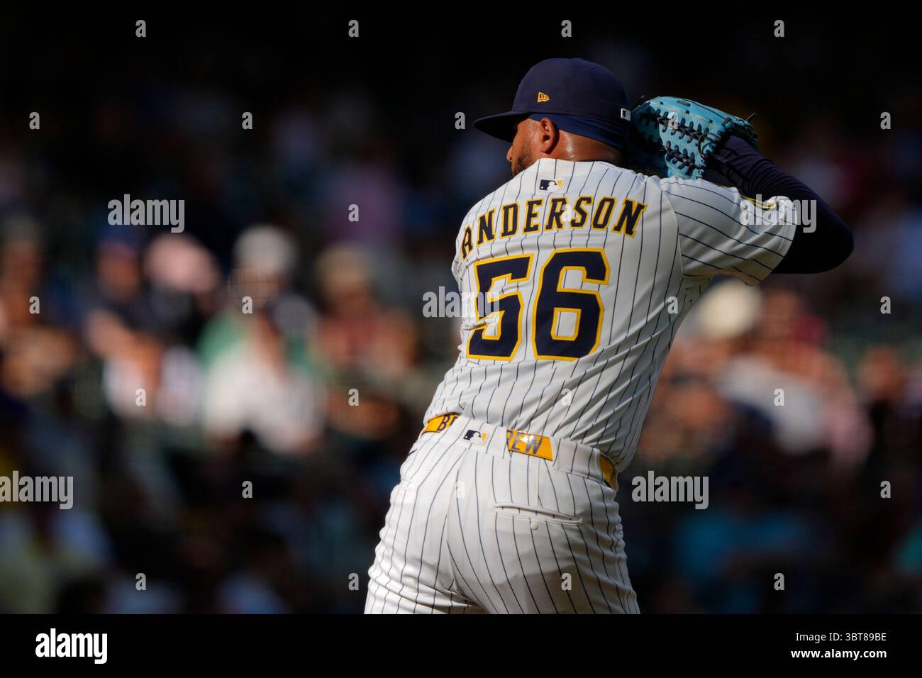 Milwaukee Brewers' Grant Anderson pitches during a baseball game ...