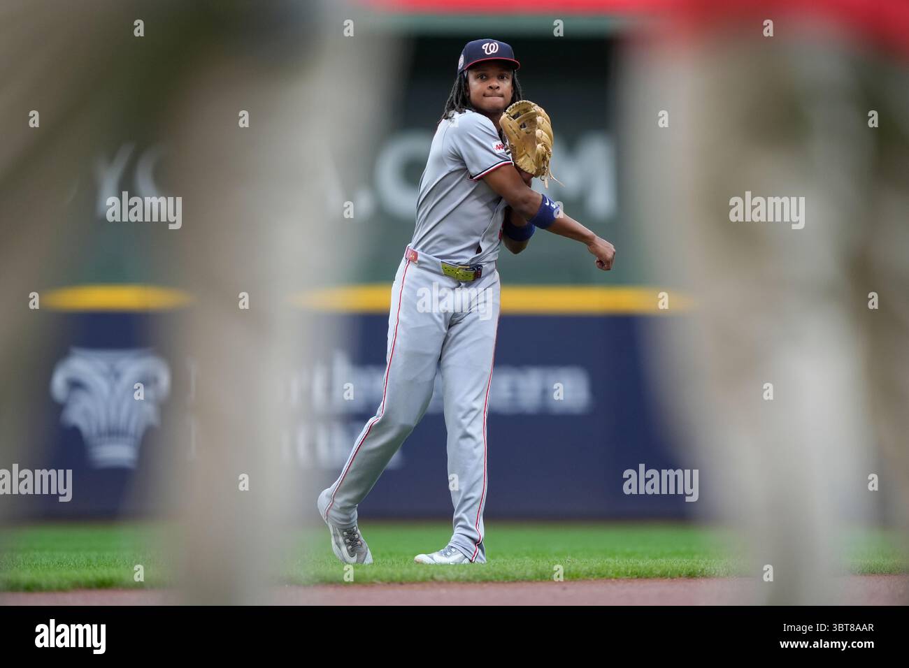 Washington Nationals' CJ Abrams warms up before a baseball game against ...