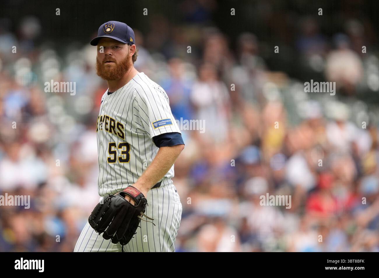 Milwaukee Brewers' Brandon Woodruff looks on during a baseball game ...