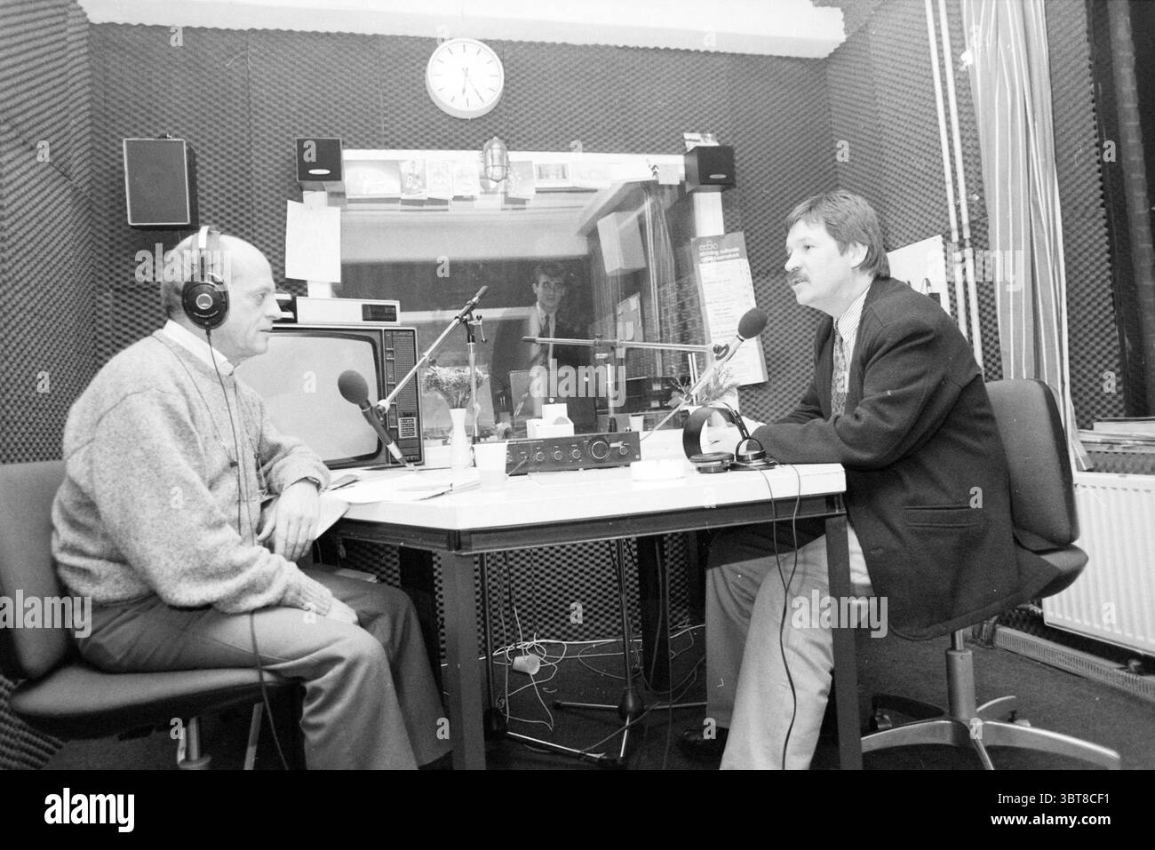 Two men talking in radio studio, Whizgle News, Dutch Desk, The ...