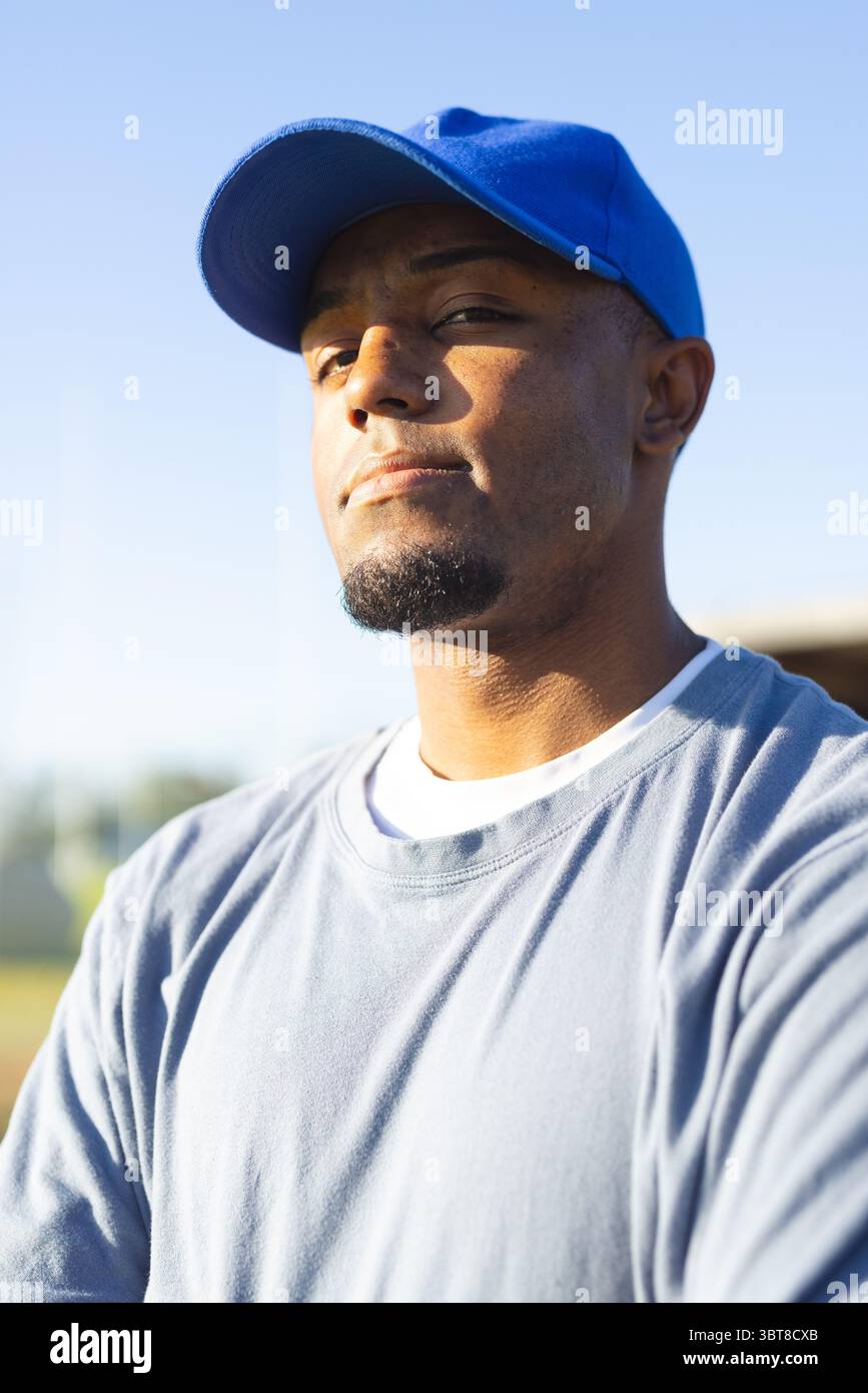 Man in cap blue shirt hi-res stock photography and images - Alamy
