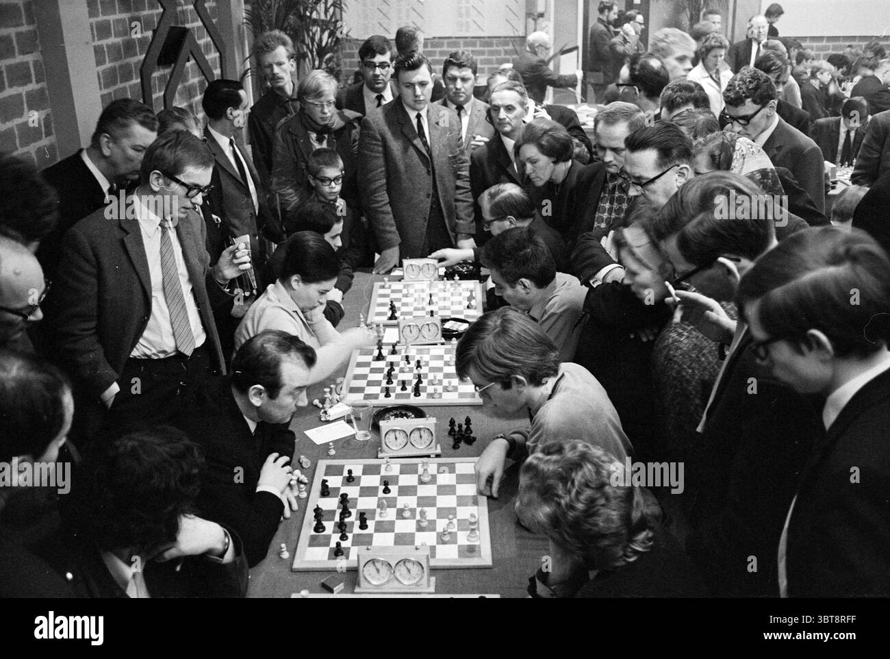 Chess players and spectators at the Hoogoven Chess Tournament in the ...