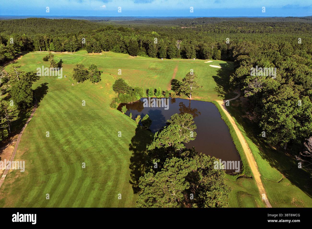 An aerial view of two holes on an Alabama golf course early in the ...