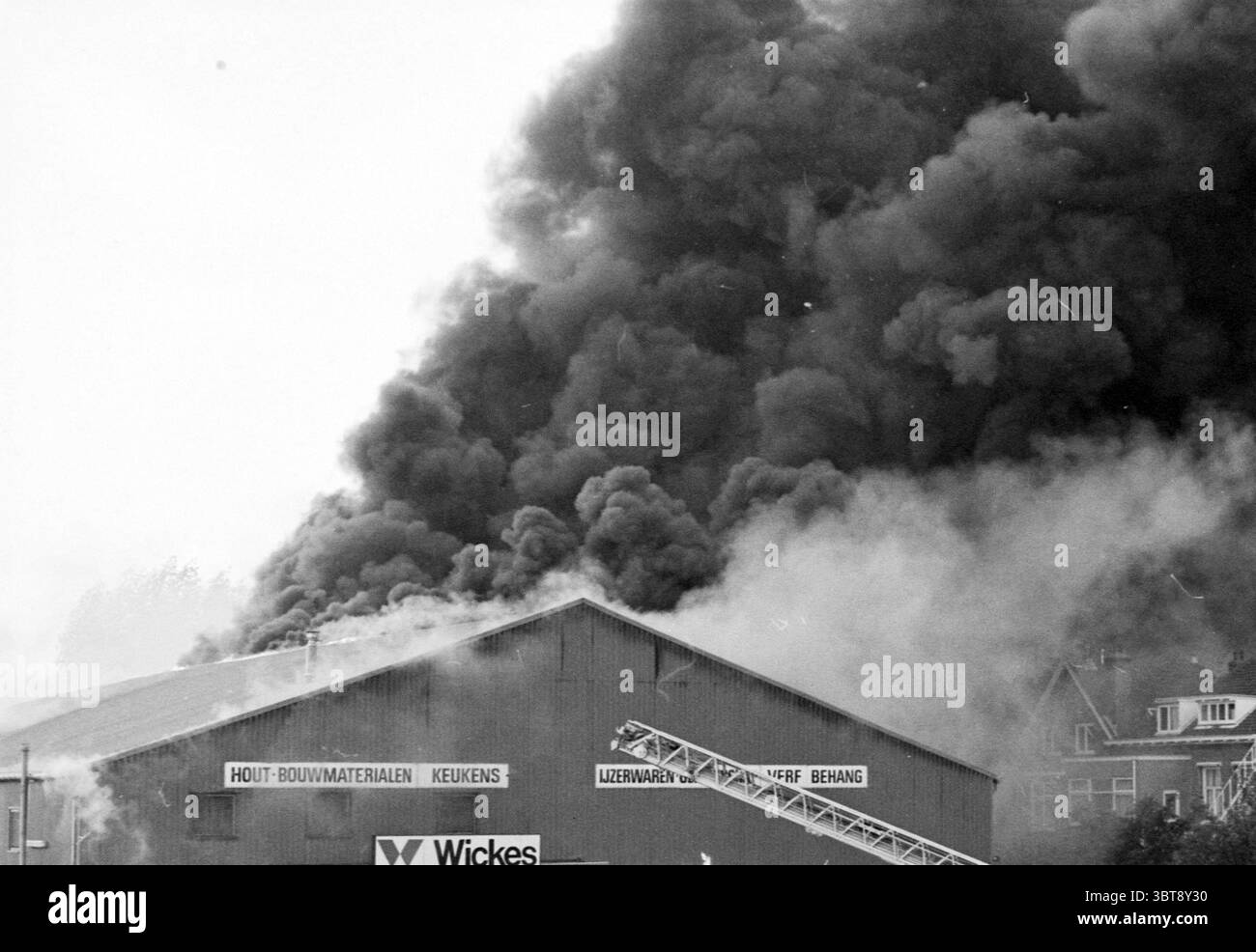 Fire department ladder against Black and White Stock Photos & Images ...
