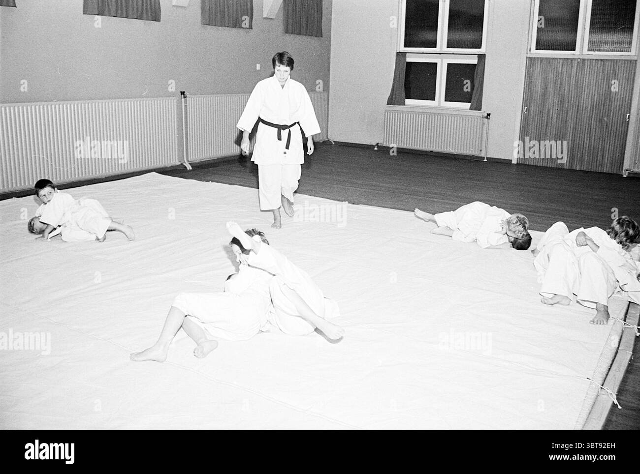 Dressed figure stands confidently Black and White Stock Photos & Images ...