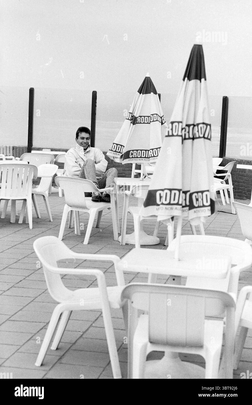 Back view of a man sitting on a chair Black and White Stock Photos ...