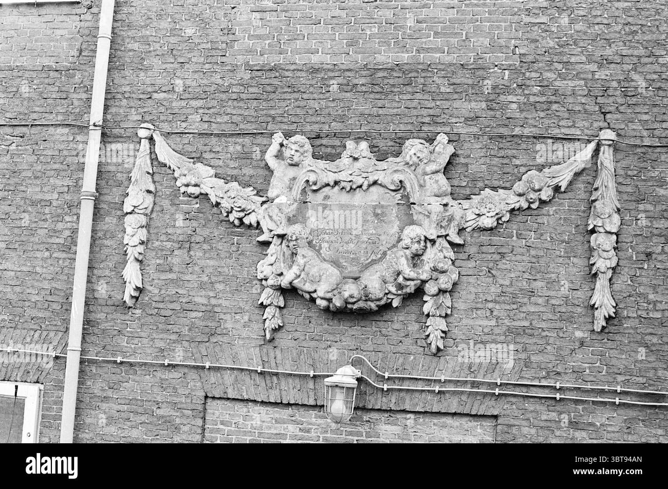 Central design of two figures flanking hi-res stock photography and ...