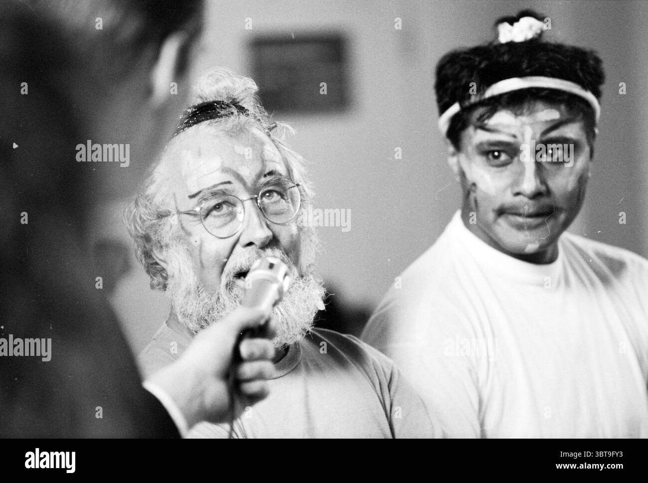 Younger man standing Black and White Stock Photos & Images - Alamy