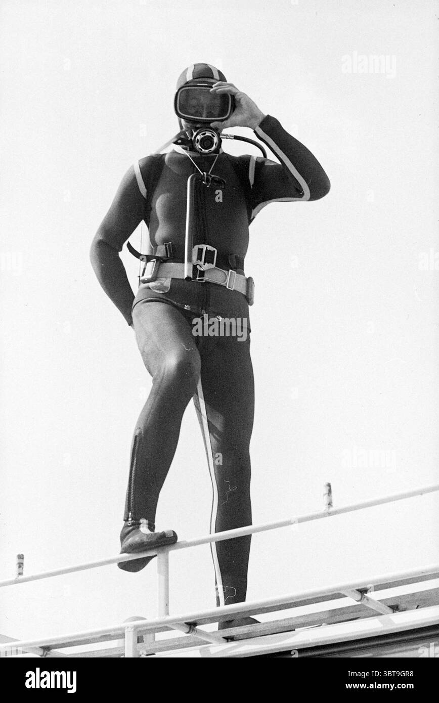 Dark wetsuit Black and White Stock Photos & Images - Alamy