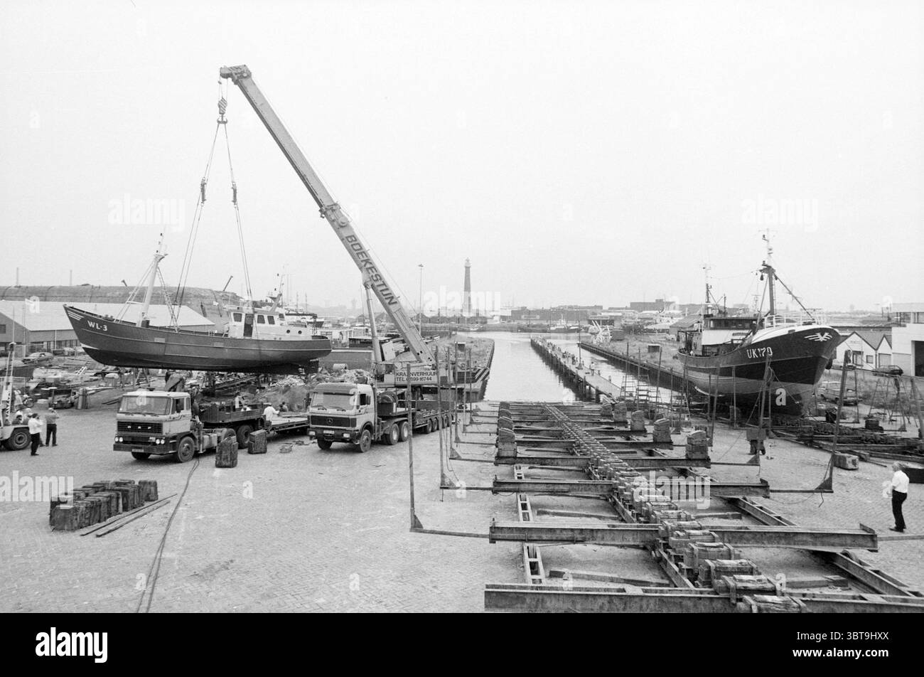Two red cranes in Black and White Stock Photos & Images - Alamy