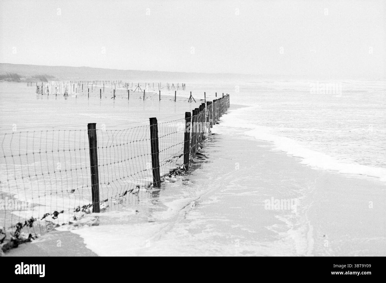Weathered wooden fence stretches across hi-res stock photography and ...